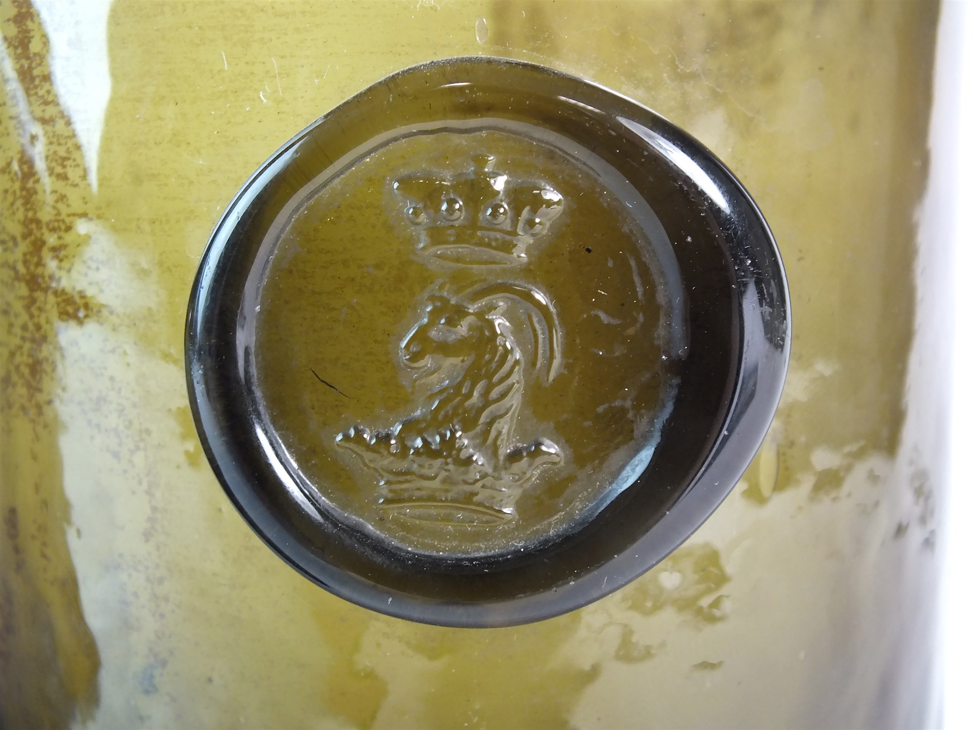 Lot 23 - Two wine bottles with the Bagot family crest