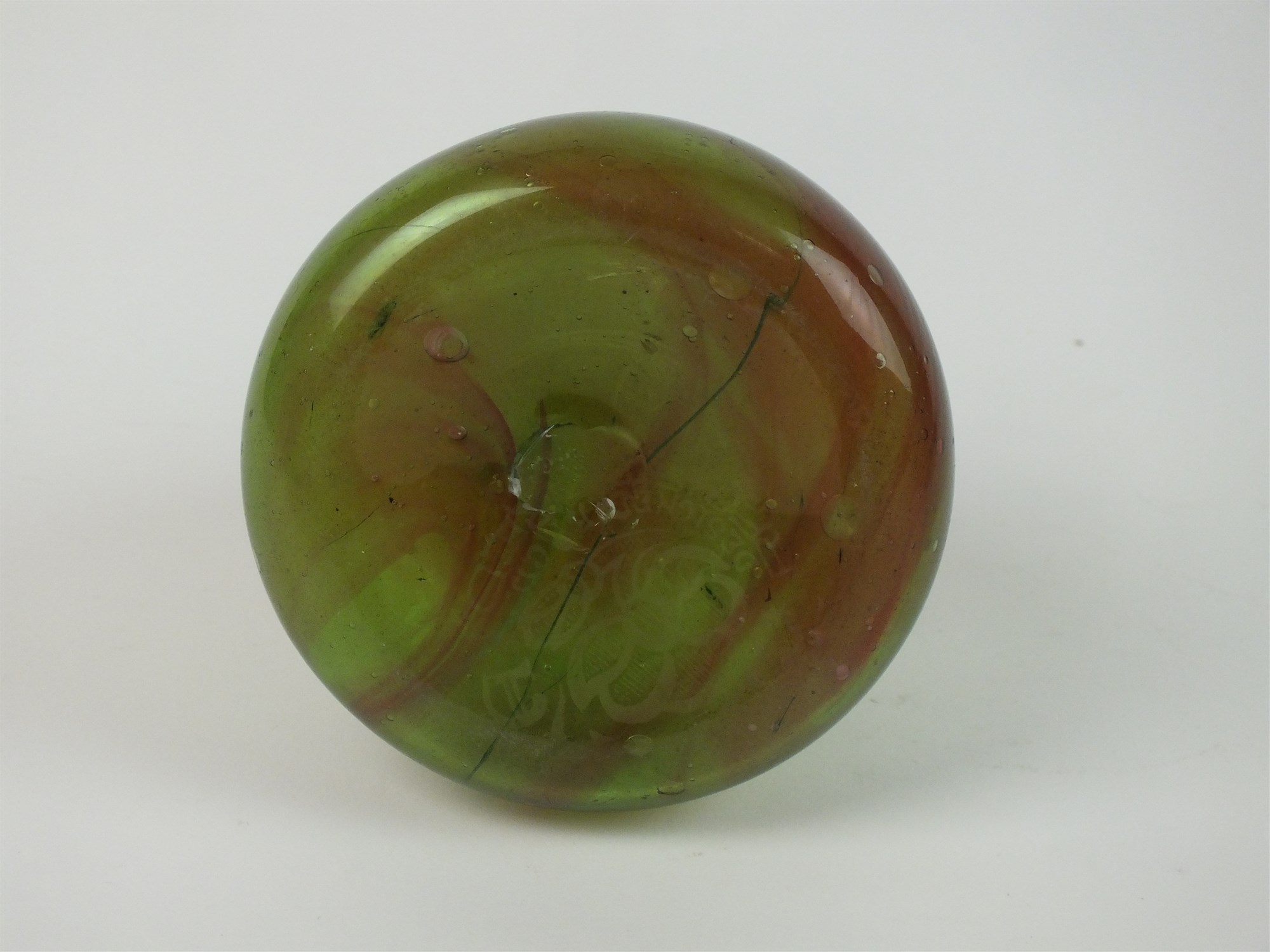 Lot 20 - A Clutha glass bottle vase designed by