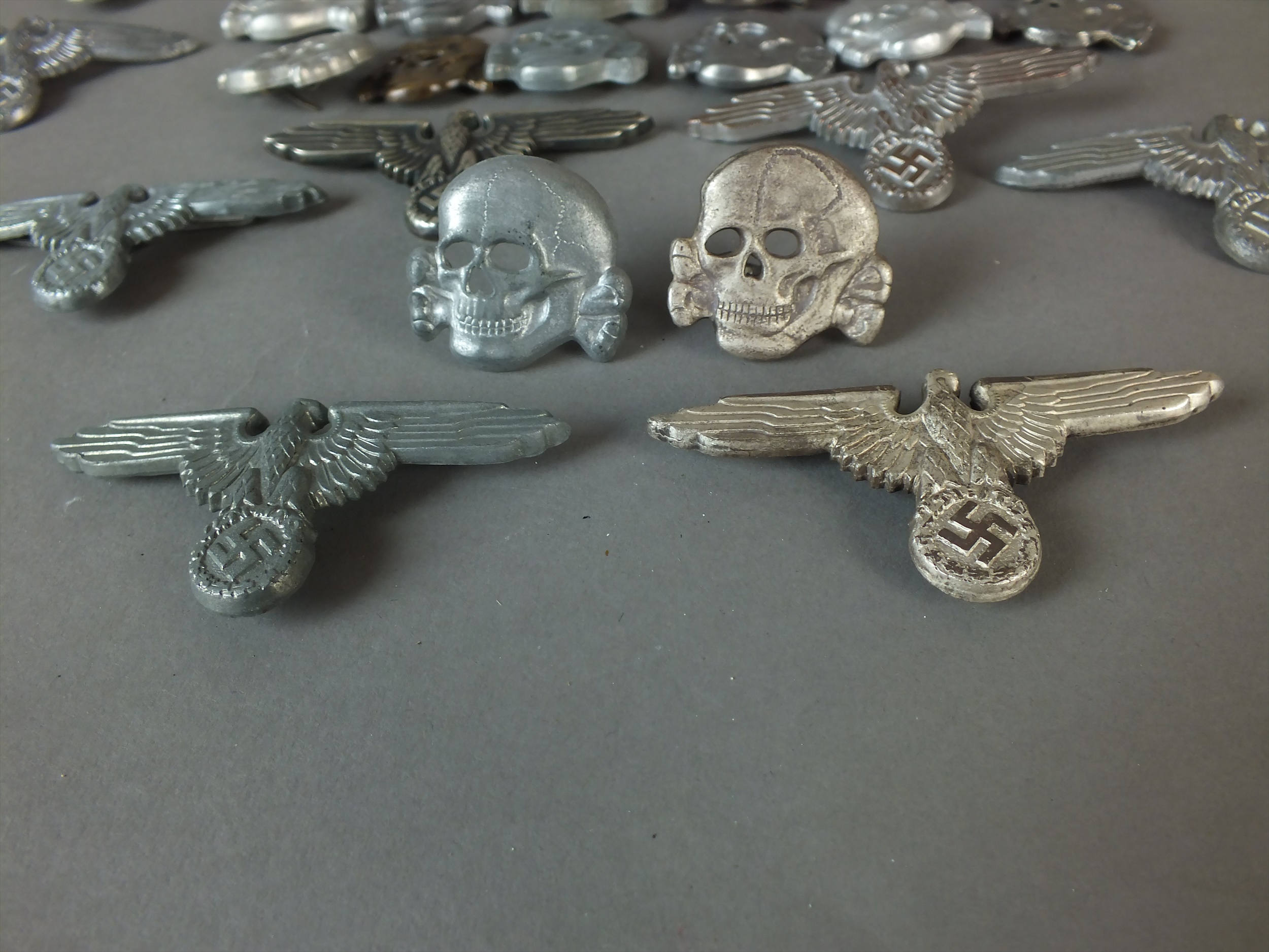Lot 336 - Reproduction German SS visor cap skulls and