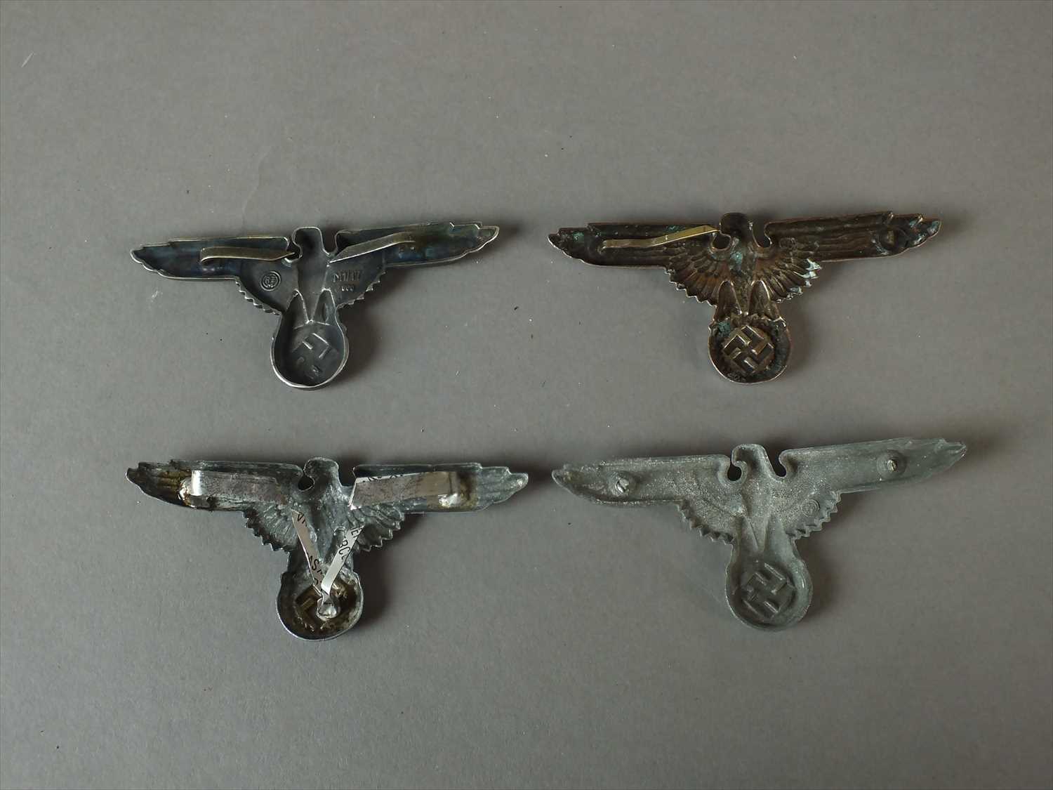 Lot 336 - Reproduction German SS visor cap skulls and