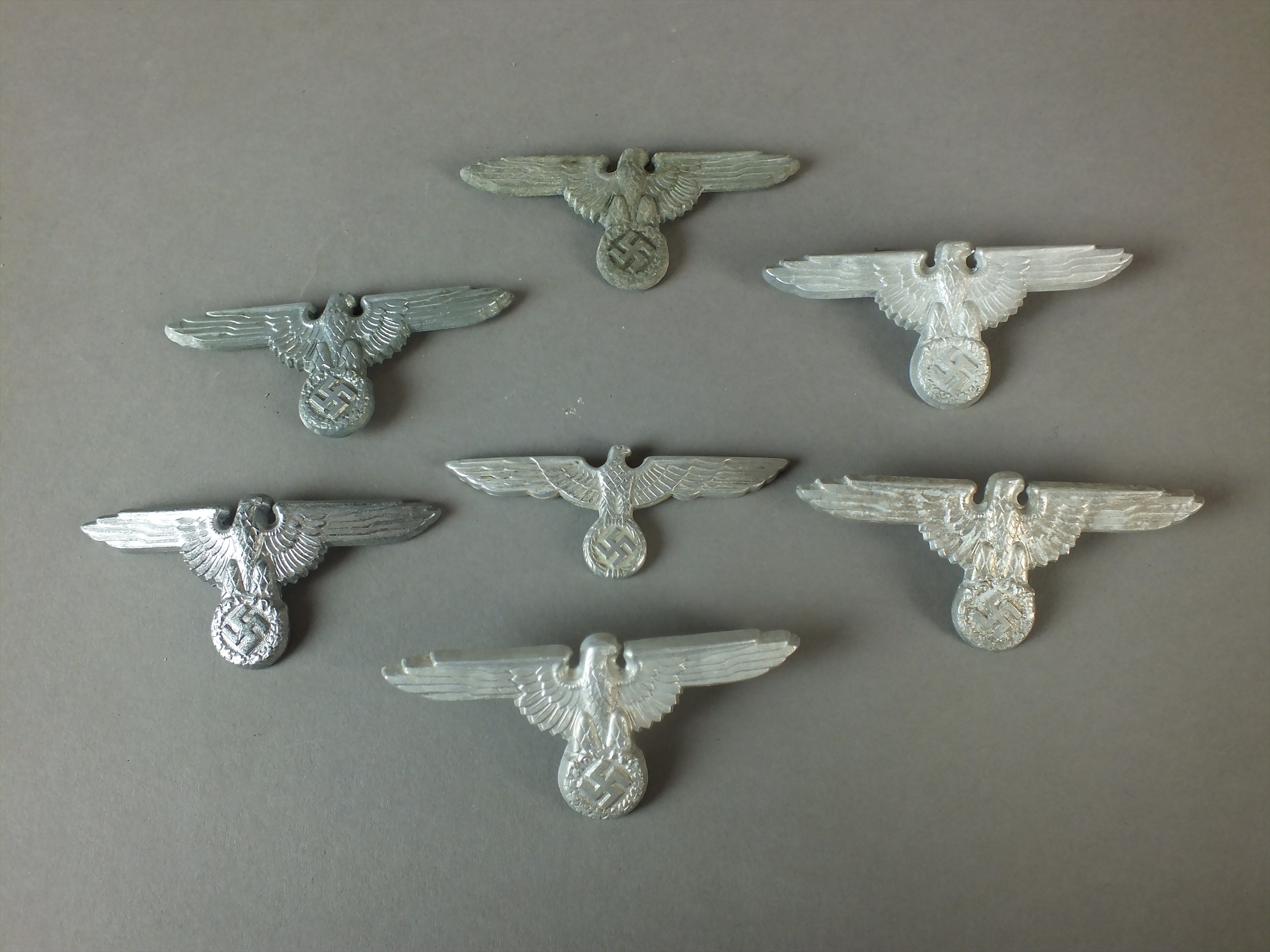 Lot 336 - Reproduction German SS visor cap skulls and