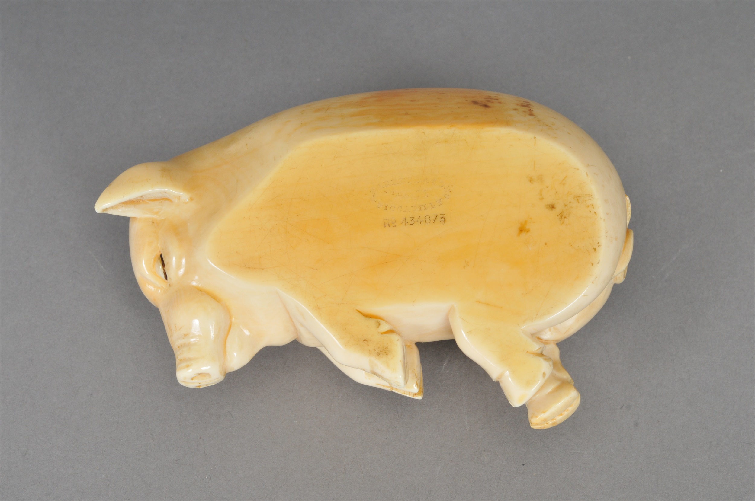 Lot 476 - 'The Lucky Pig', an Edwardian ivory model by