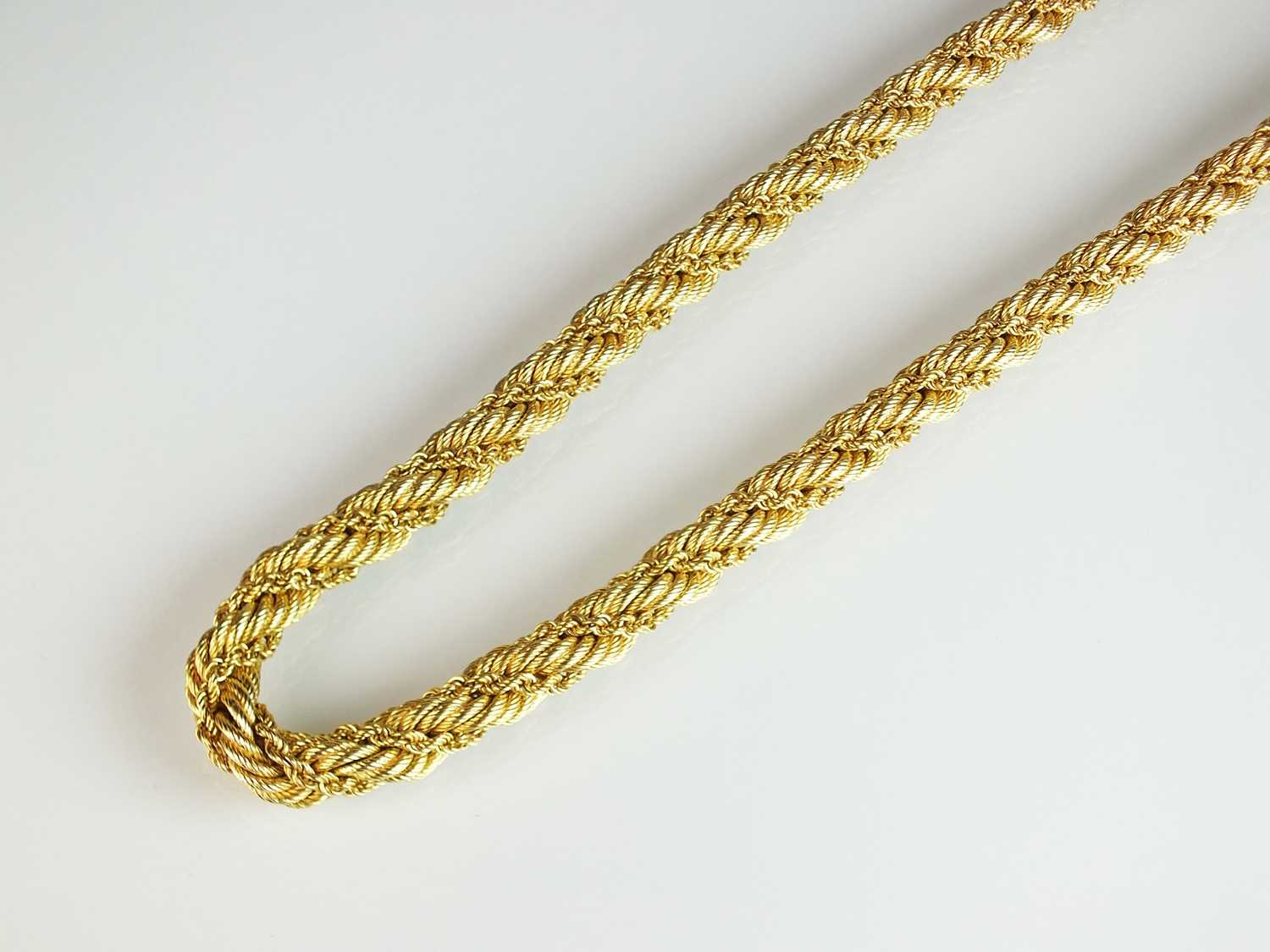 Lot 84 - An 18ct gold double rope twist chain necklace