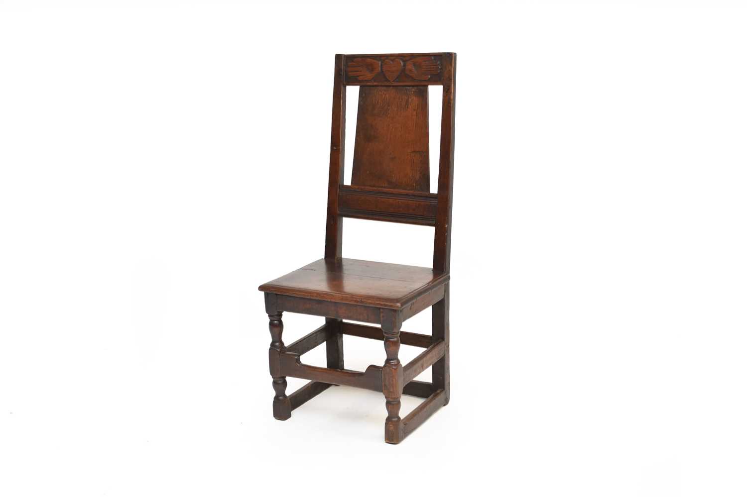 An 18th century joined and carved oak 'marriage' chair | Barnebys