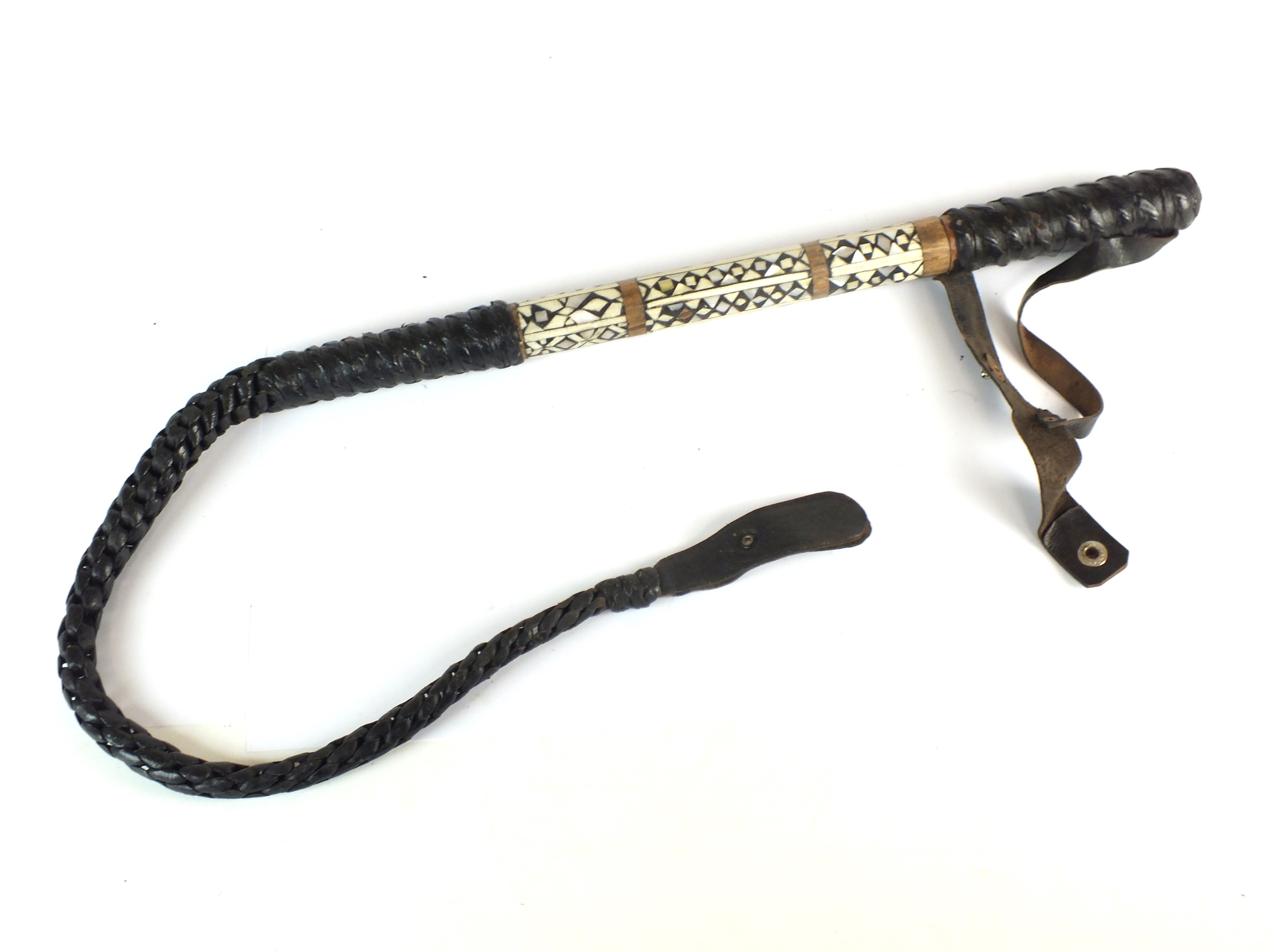 Lot 98 - North African camel whip, early 20th century