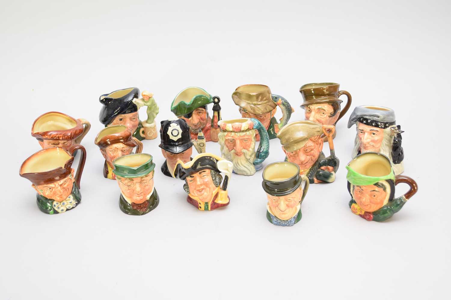 Lot 400 - A collection of Royal Doulton character jugs,