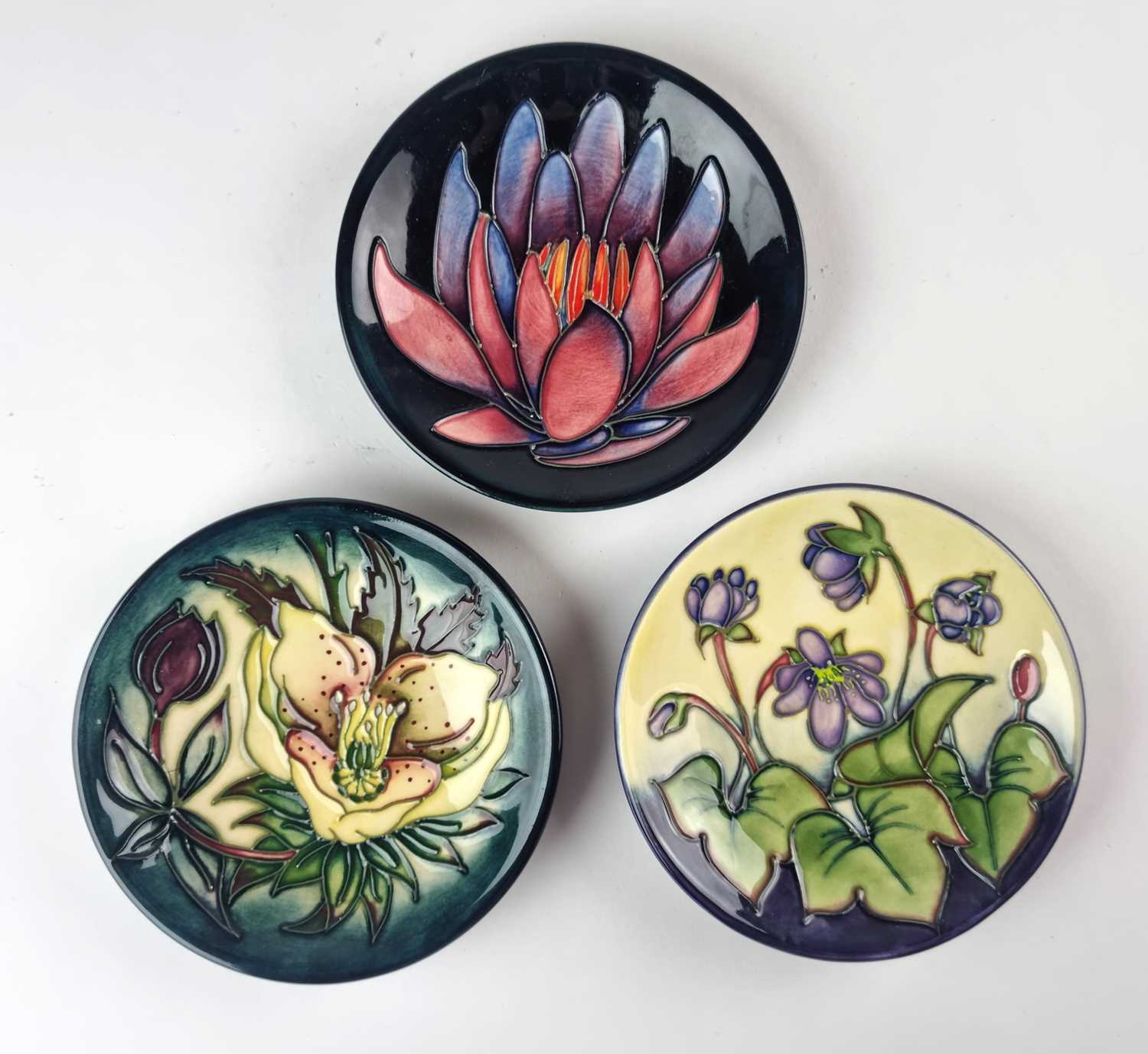 Lot 242 - Nine Moorcroft pin dishes including Hibiscus,