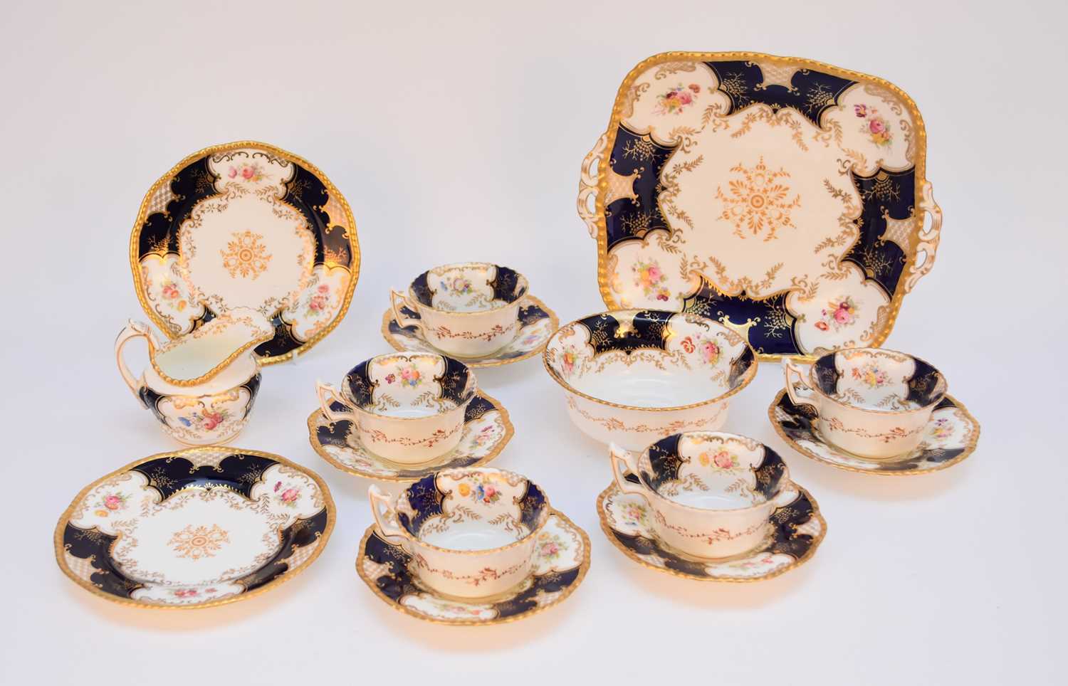 Lot 117 - A Coalport blue 'batwing' tea service, late