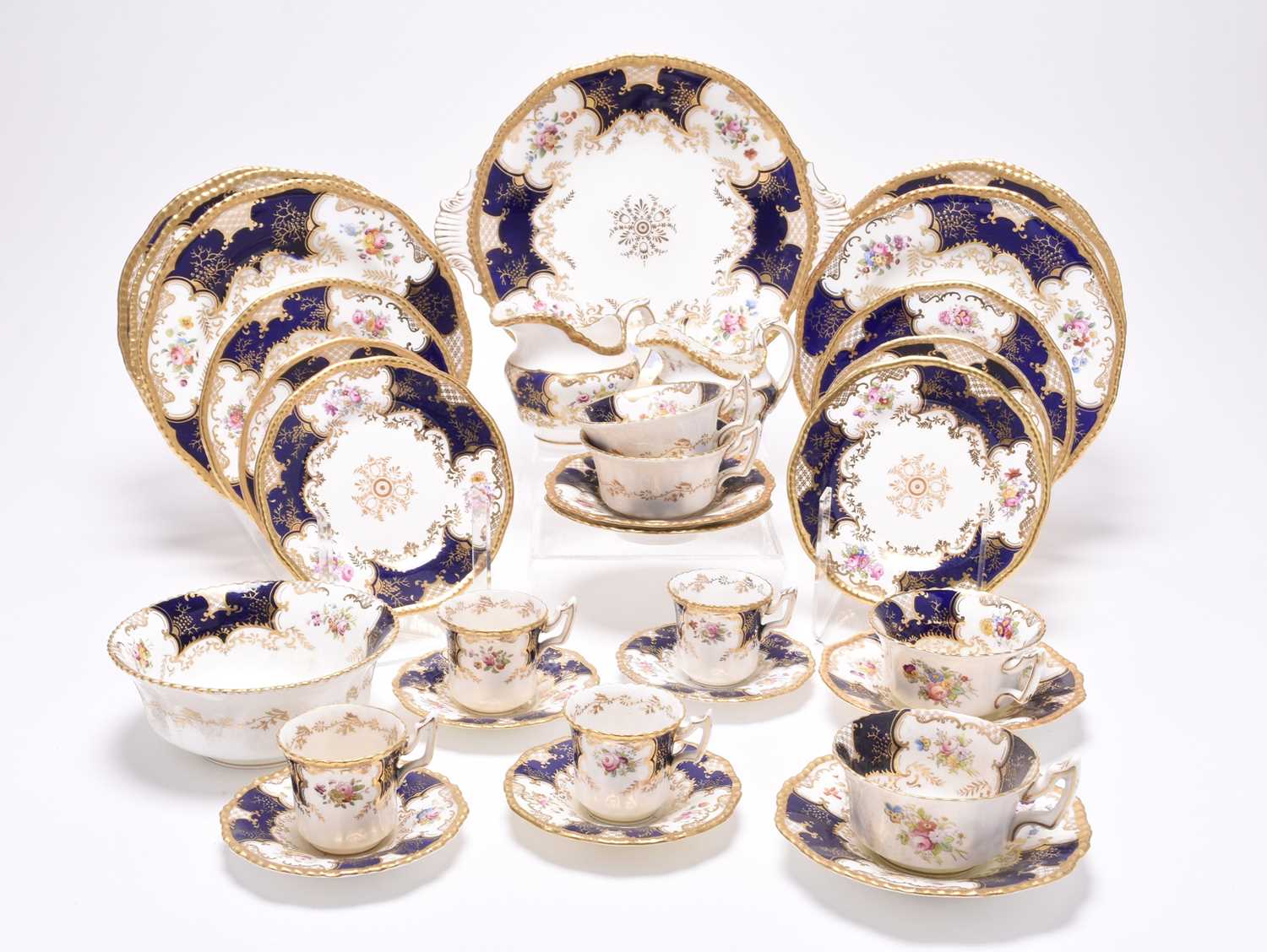 Lot 21 - A Coalport blue batwing tea, coffee and part