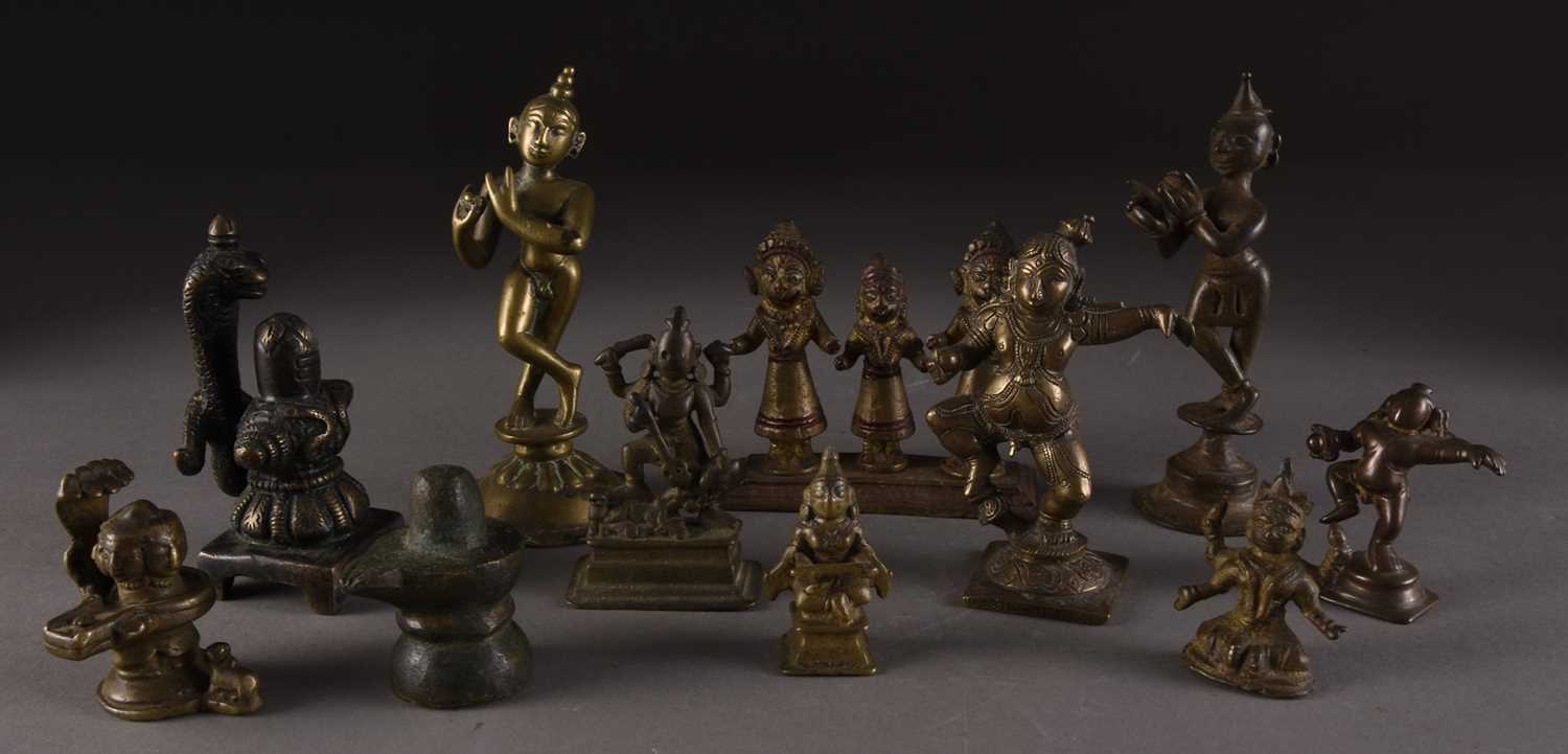 Lot 9 - An assembled group of Indian bronze figures of