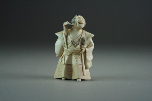 Lot 494 - A Japanese ivory netsuke of a Samurai, Meiji